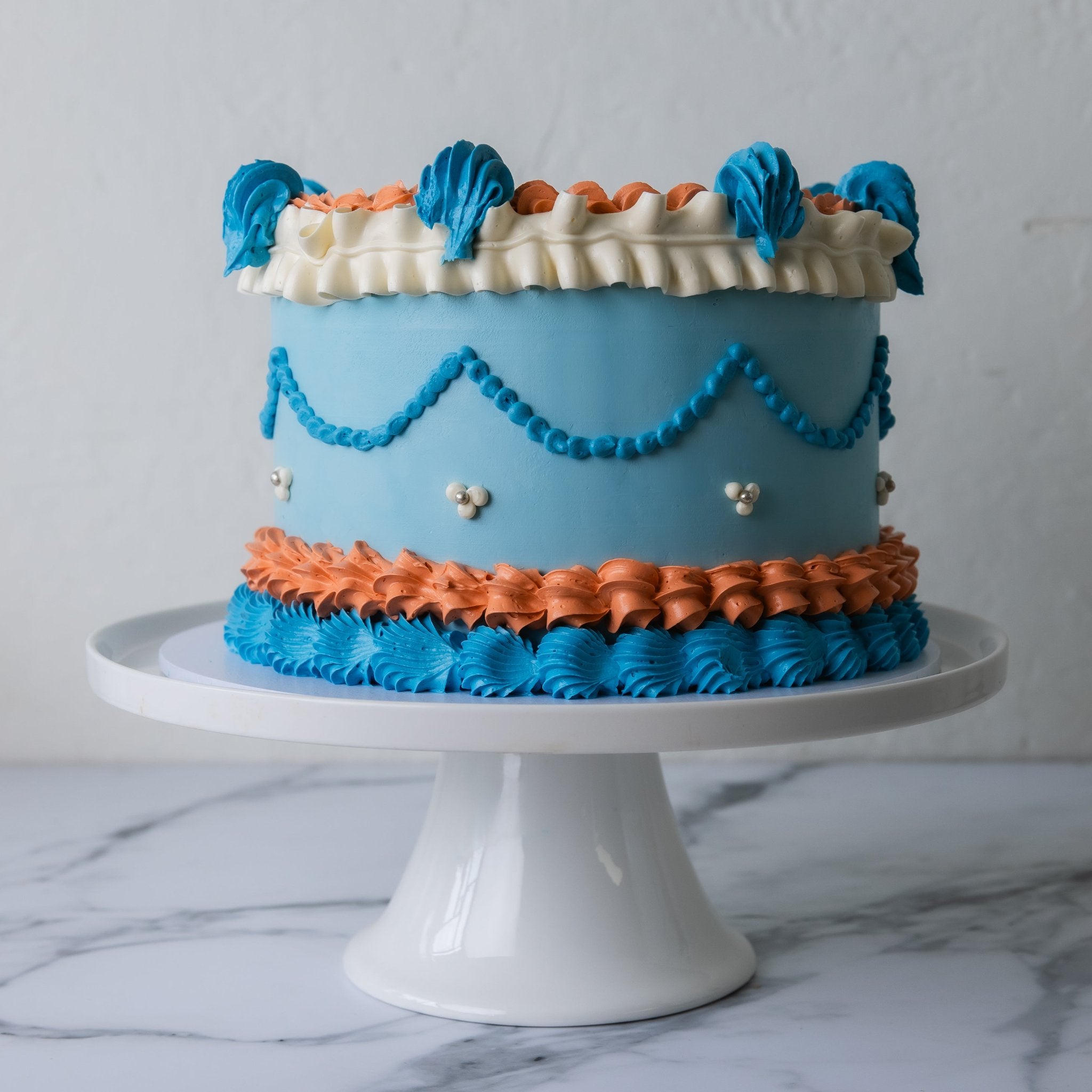 Vintage blue layer cake - Classic & Customizable | Millstone Patisserie